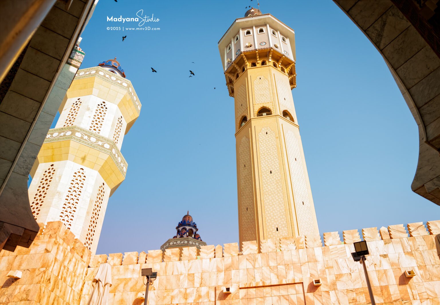 Discover the beauty of the Great Mosque of Touba through breathtaking images